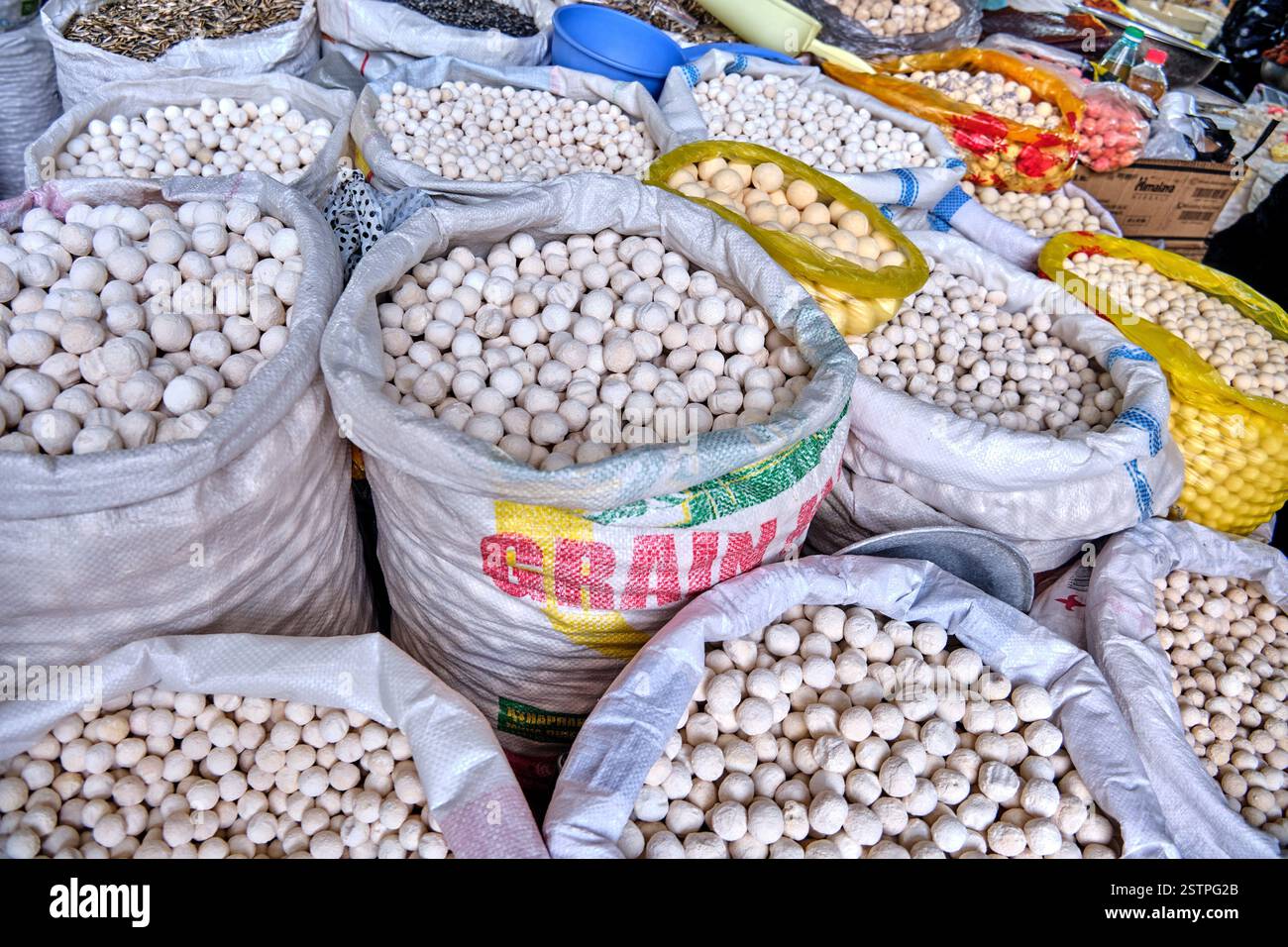 Bags with various types of traditional dried salted cheese, known as ...