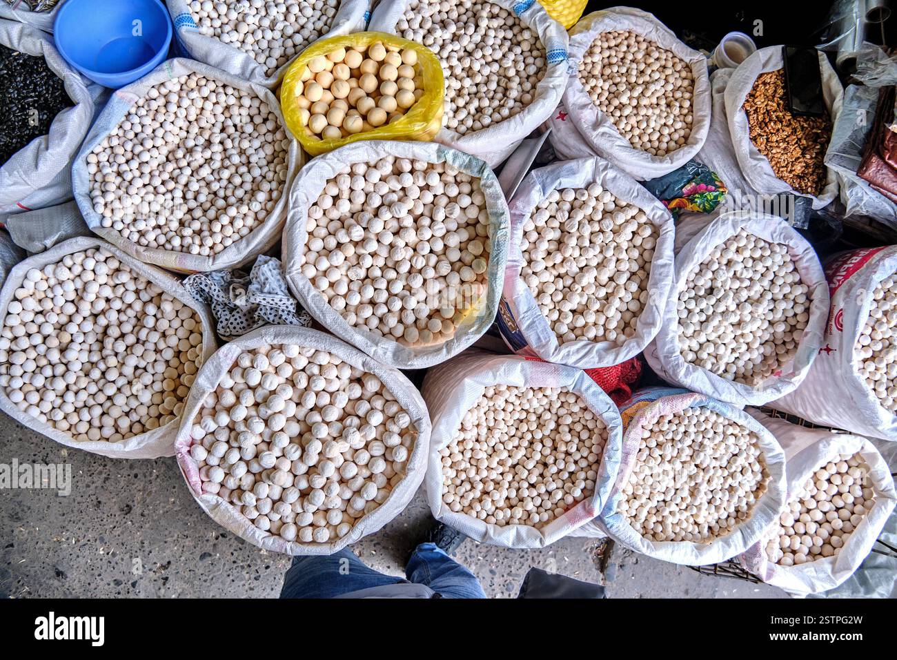 Bags with various types of traditional dried salted cheese, known as ...