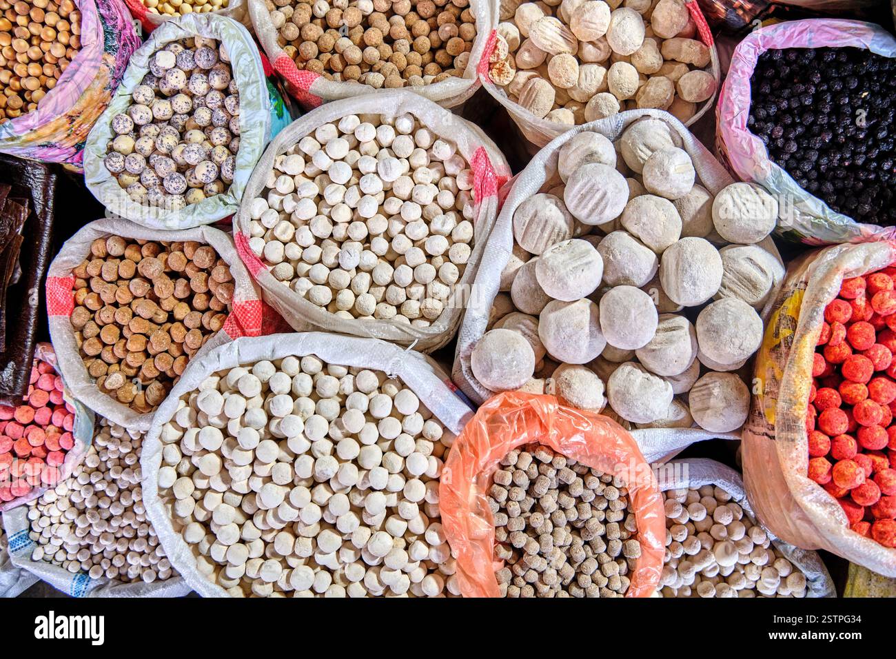Bags with various types of traditional dried salted cheese, known as ...