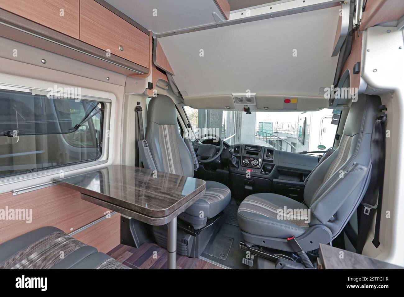 Camping van cabin interior with turning seats hi-res stock photography ...