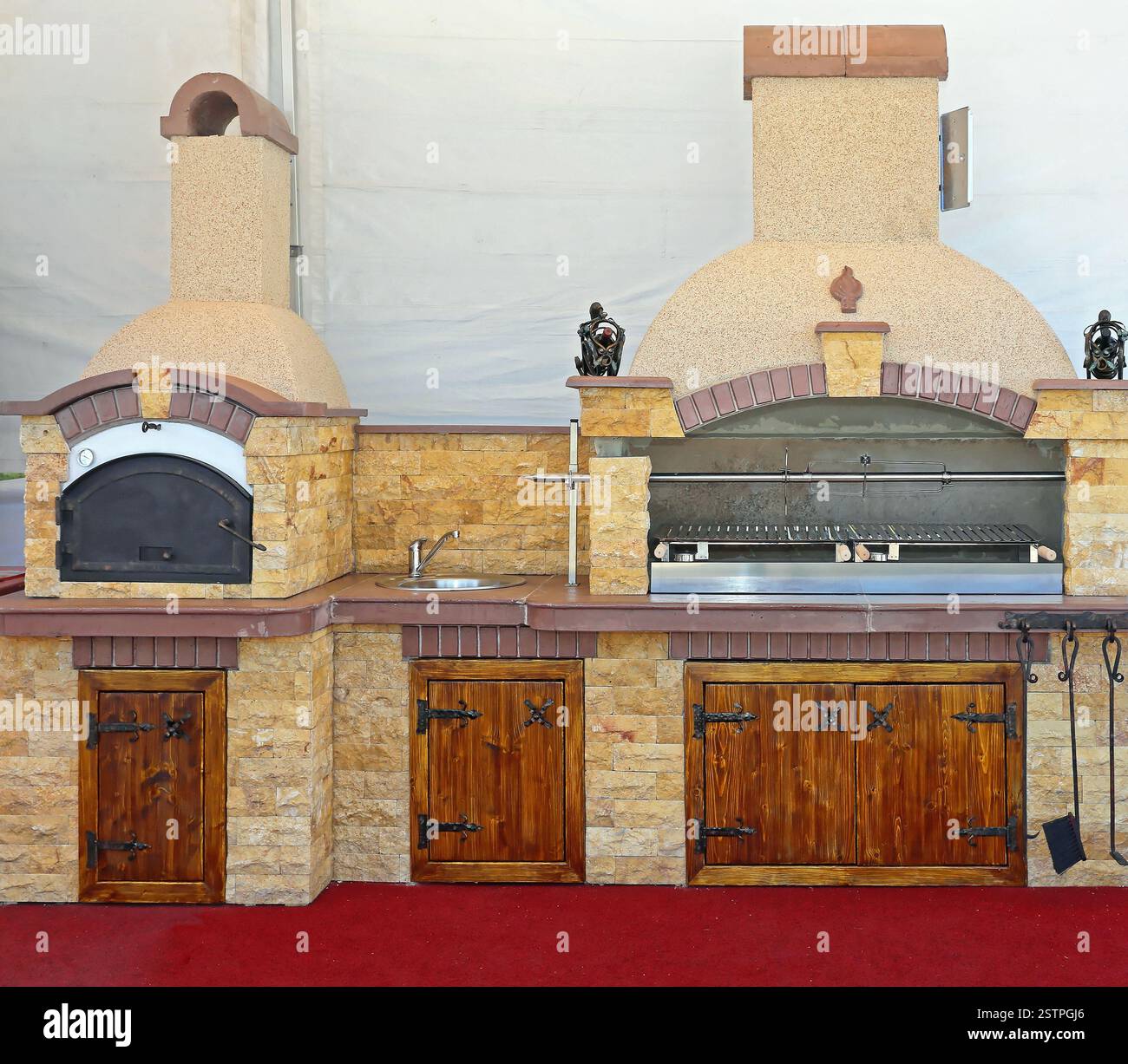 Stone grill with automated rotisserie italian masonry hi-res stock ...