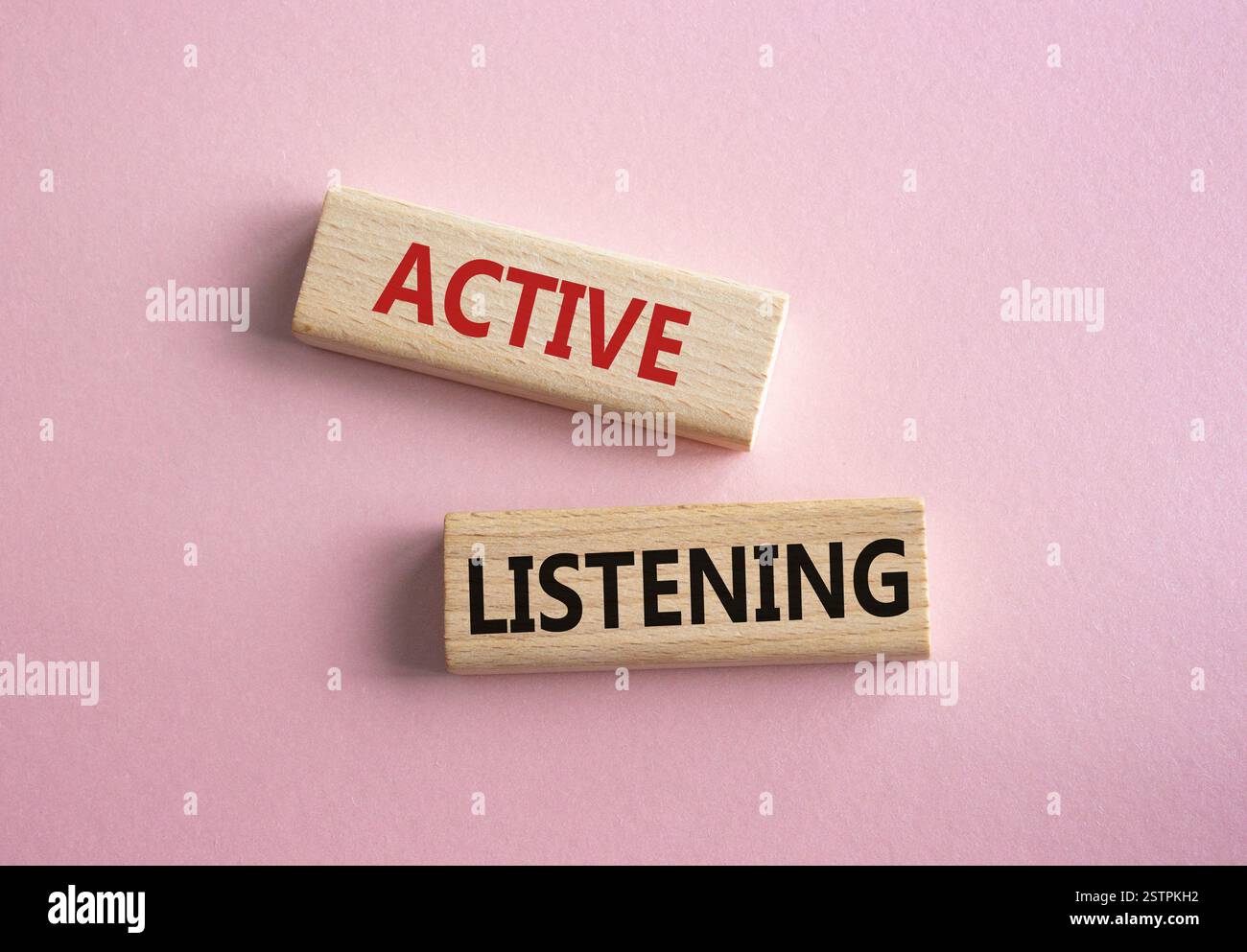 Active listening symbol. Wooden blocks with words Active listening ...
