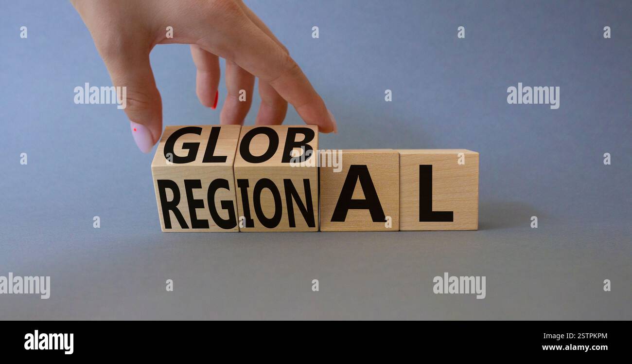 Global and Local symbol. Businessman hand turnes wooden cubes and ...