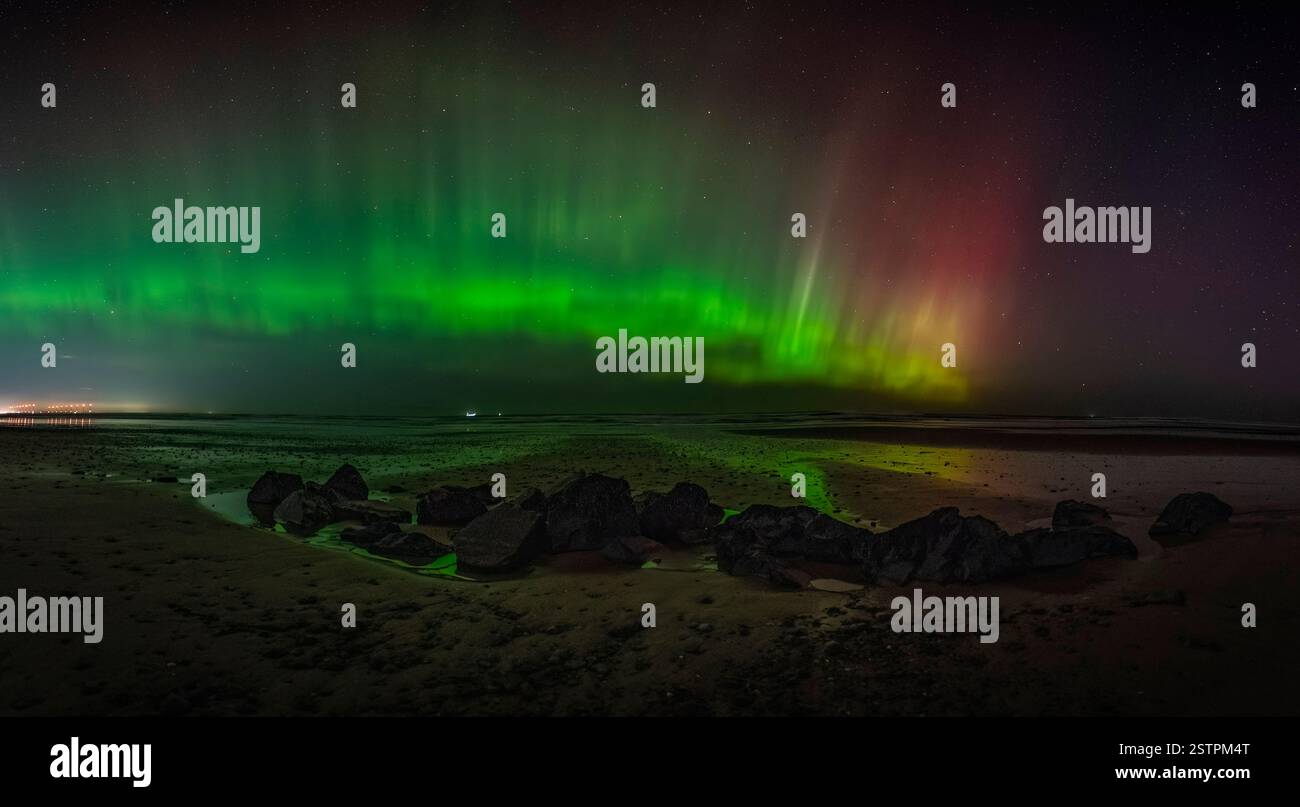 Aurora Beach Reflections Stock Photo - Alamy