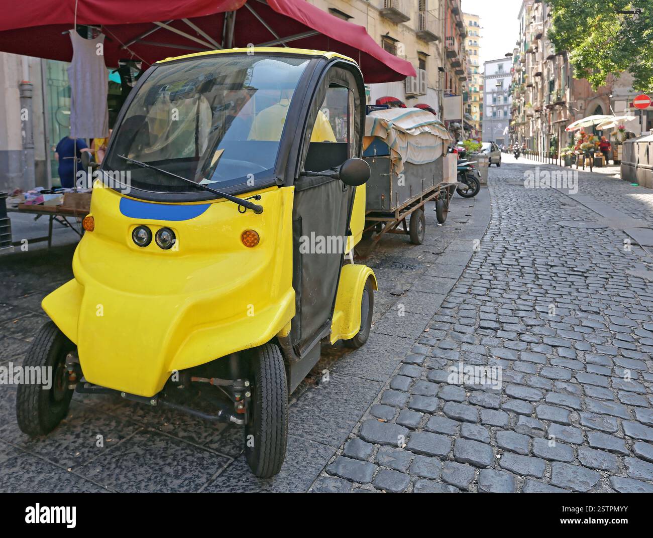 Small Electric Utility Car in Naples Italy Stock Photo - Alamy