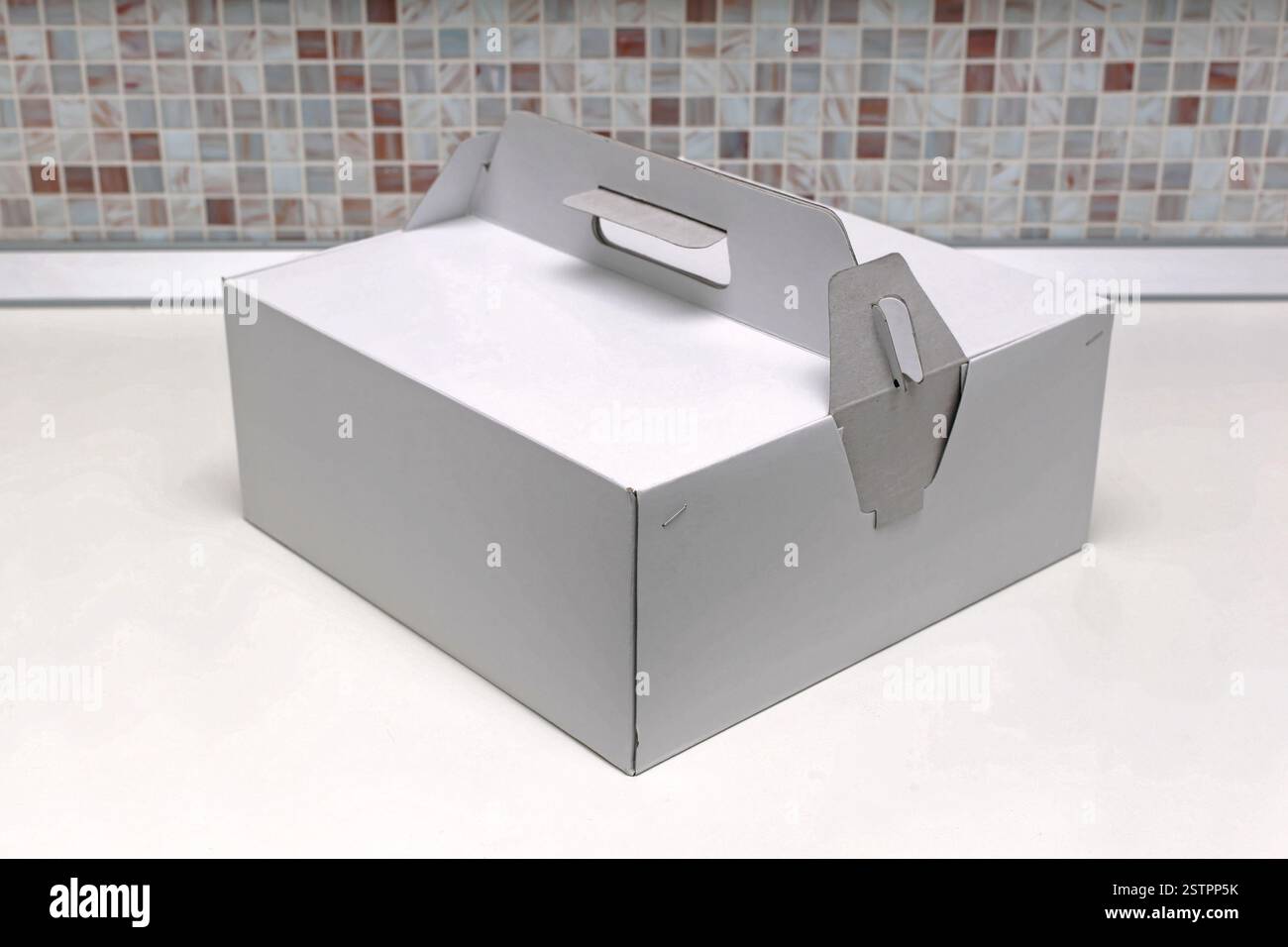 Big White Cardboard Box For Cake Transport Protection Stock Photo - Alamy