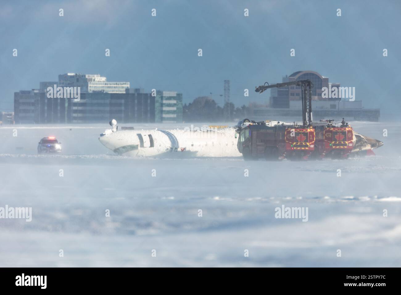 The wreckage of Delta Connection Flight 4819 after it crashed at ...