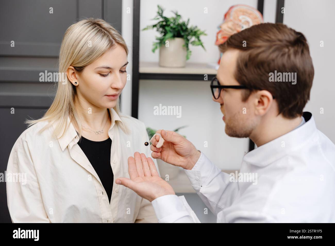 Attractive blonde woman trying hear hi-res stock photography and images ...
