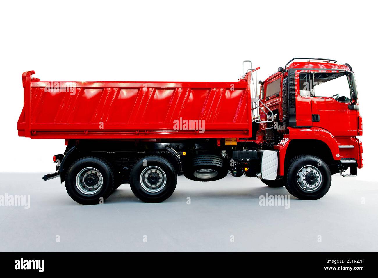 Red dump truck hi-res stock photography and images - Alamy