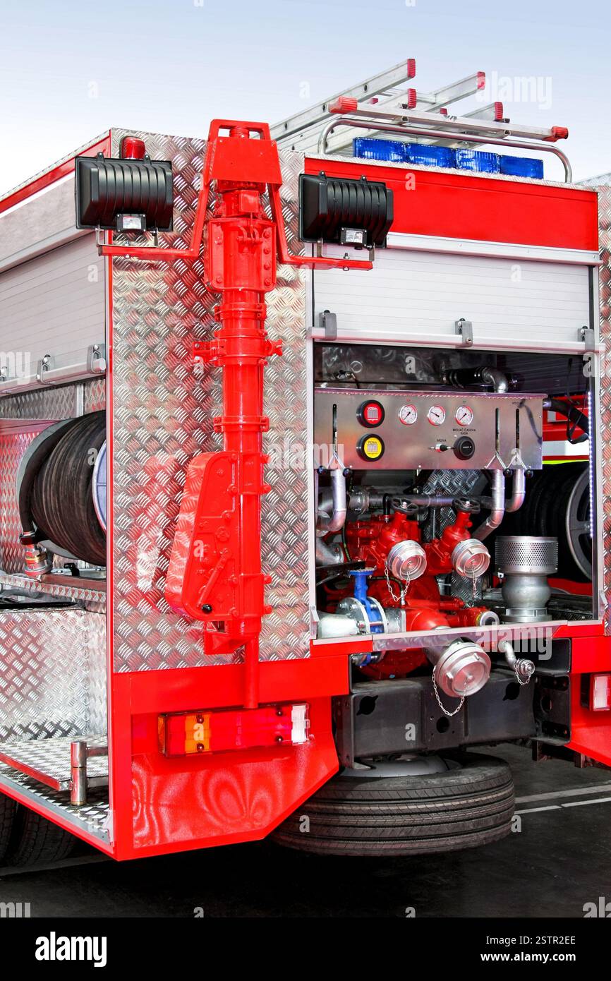 Water and foam pump engine in fire truck Stock Photo - Alamy
