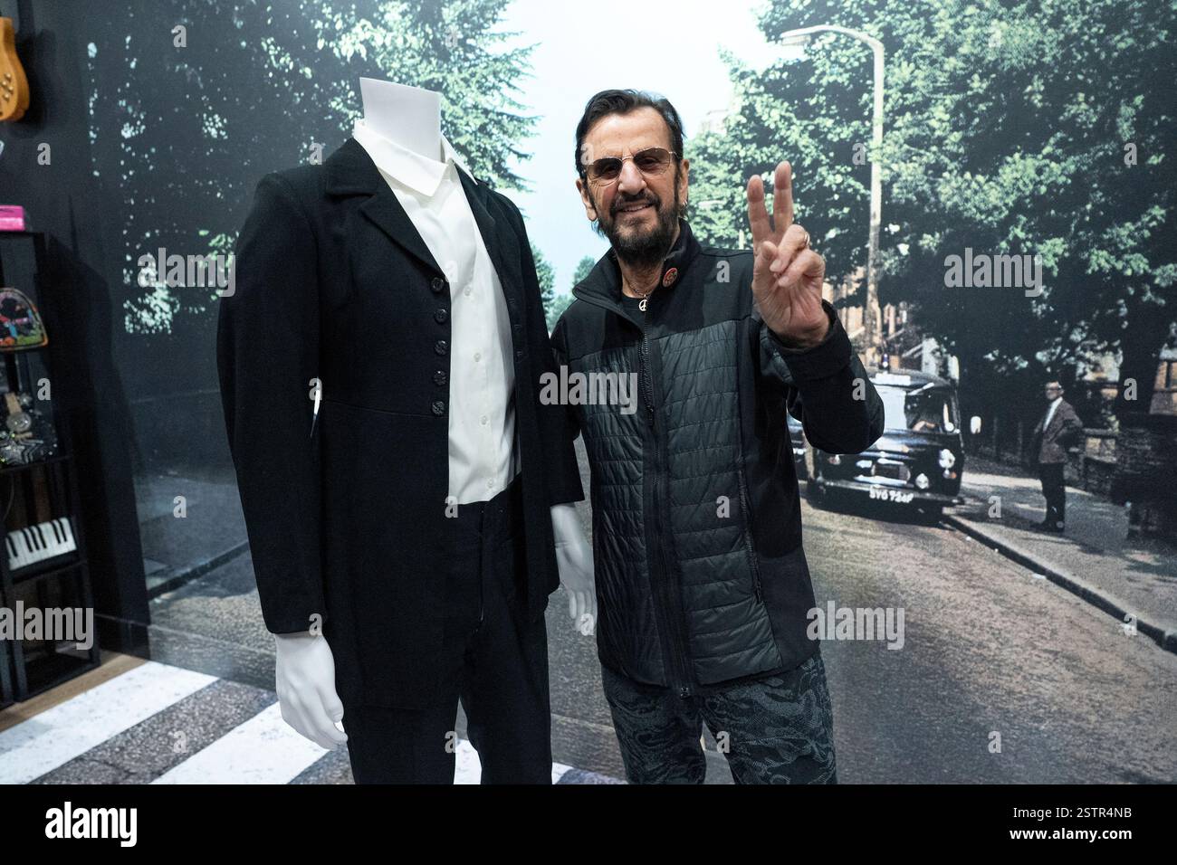 Ringo Starr poses during the private ribbon cutting at the Musicians ...