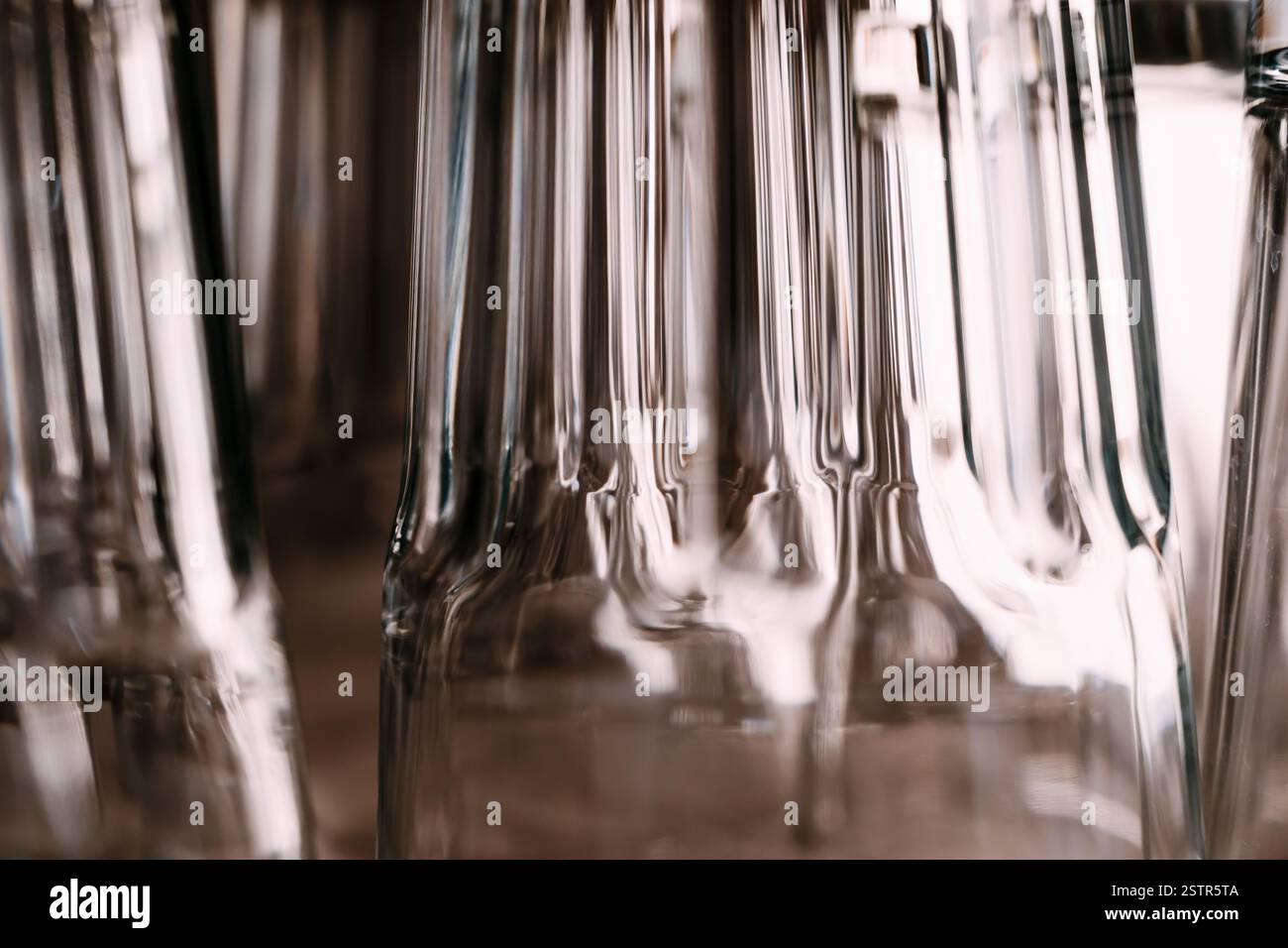 Set of empty clean drinking glasses on kitchen counter top after ...