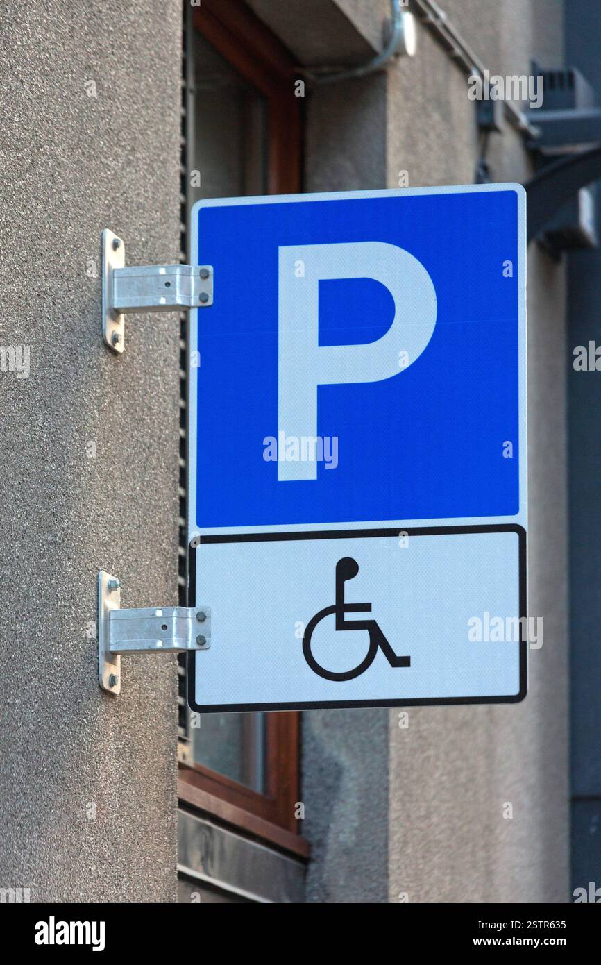 Disabled only parking traffic sign at wall hi-res stock photography and ...