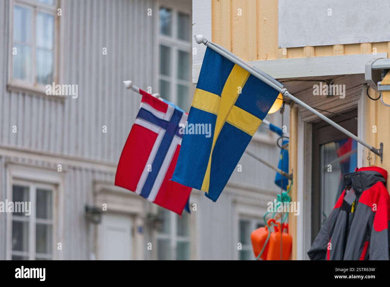Swedish and norwegian flags together in front of shop hi-res stock ...