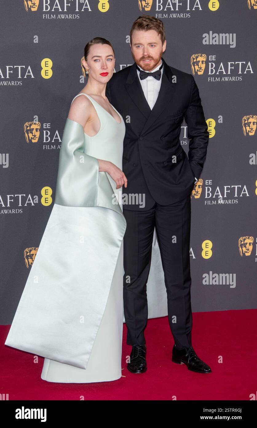 Saoirse Ronan and Jack Lowden at the 78th British Academy Film Awards ...
