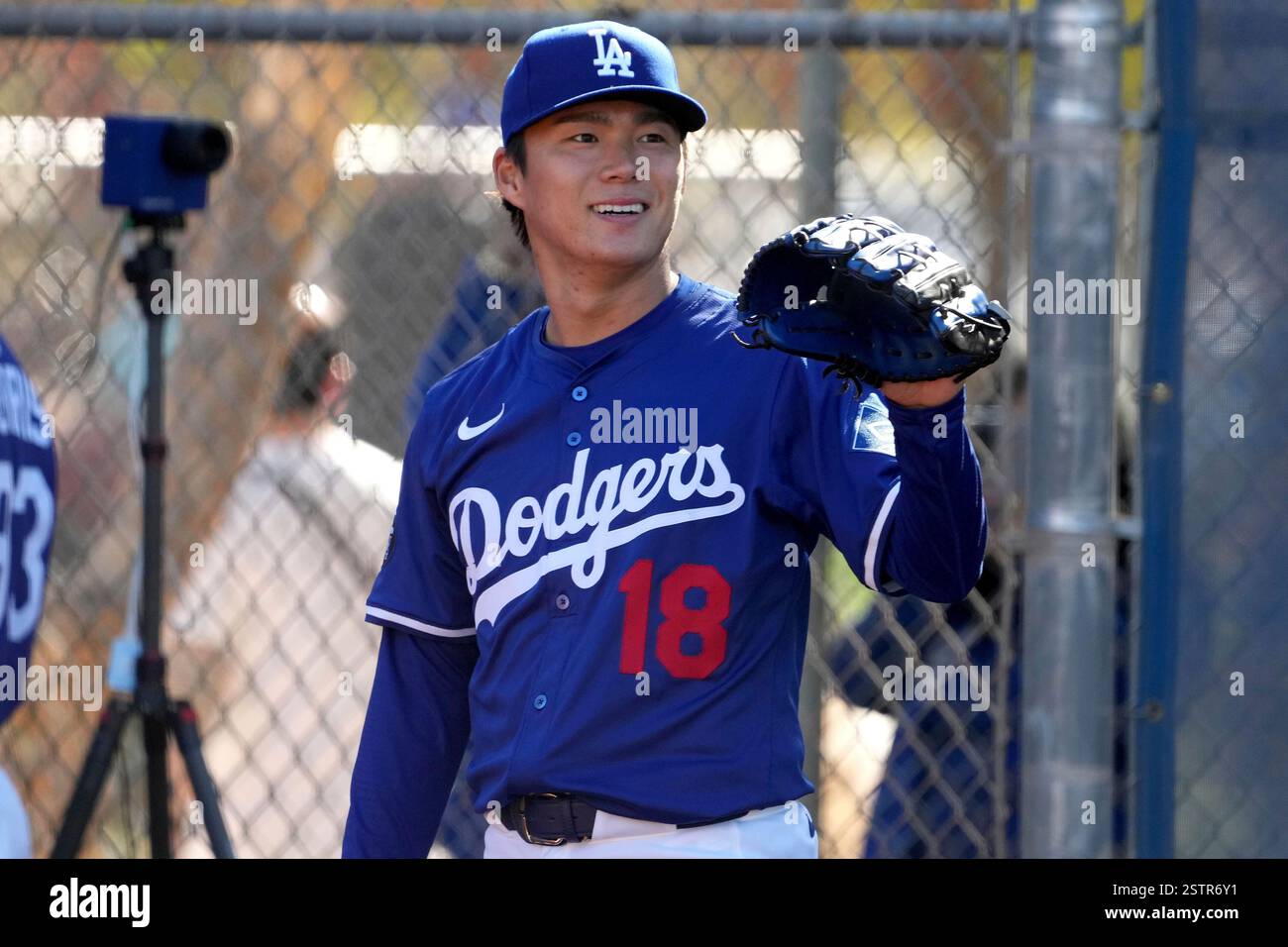 Los Angeles Dodgers pitcher Yoshinobu Yamamoto (18) throws a bullpen ...