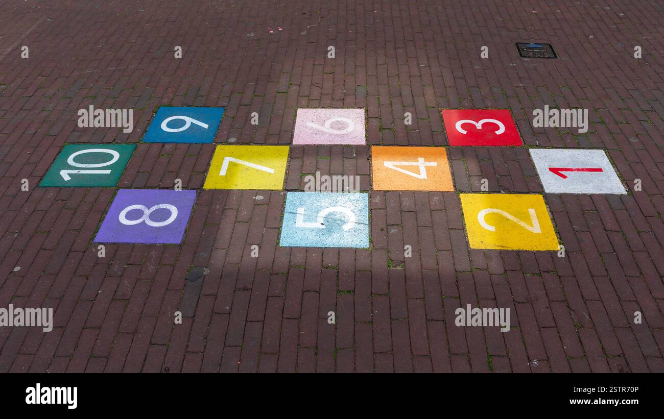 Colourful Hopscotch Playground Markings Numbers at Pavement Stock Photo ...
