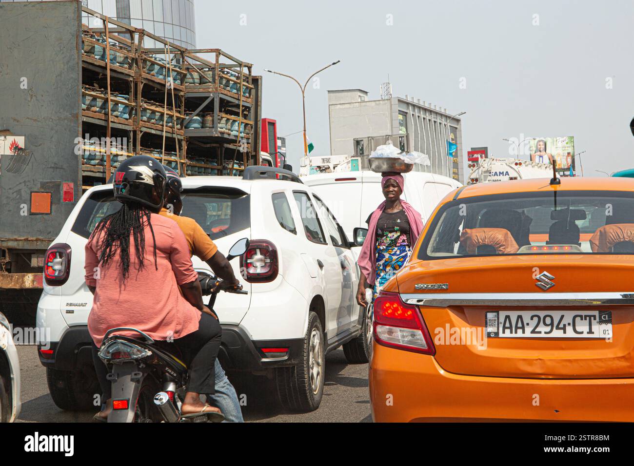 Road sellers in Abidjan, Ivory-Coast is one of the risky business that ...