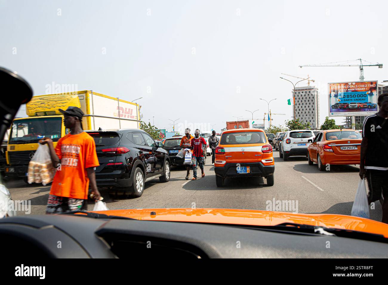 Road sellers in Abidjan, Ivory-Coast is one of the risky business that ...