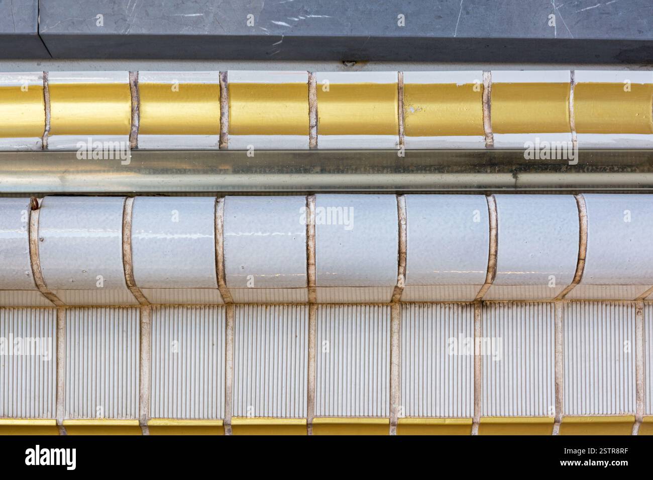 Gold ceramic tiles hi-res stock photography and images - Alamy