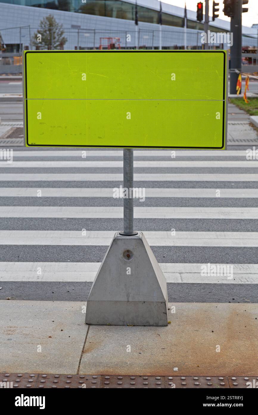 Big yellow caution sign board at street crossing hi-res stock ...