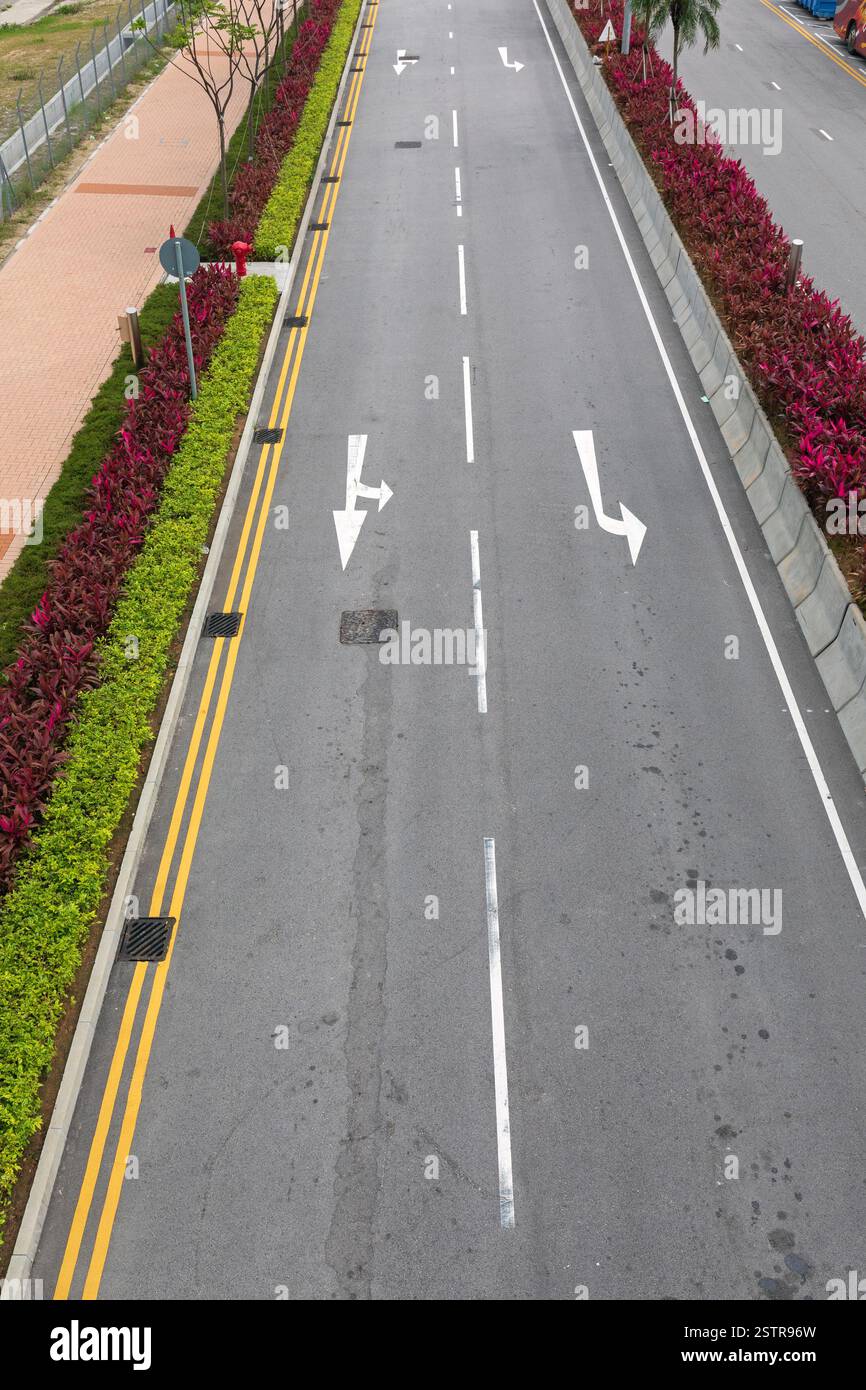 Two Lane Street Arrows Stock Photo - Alamy