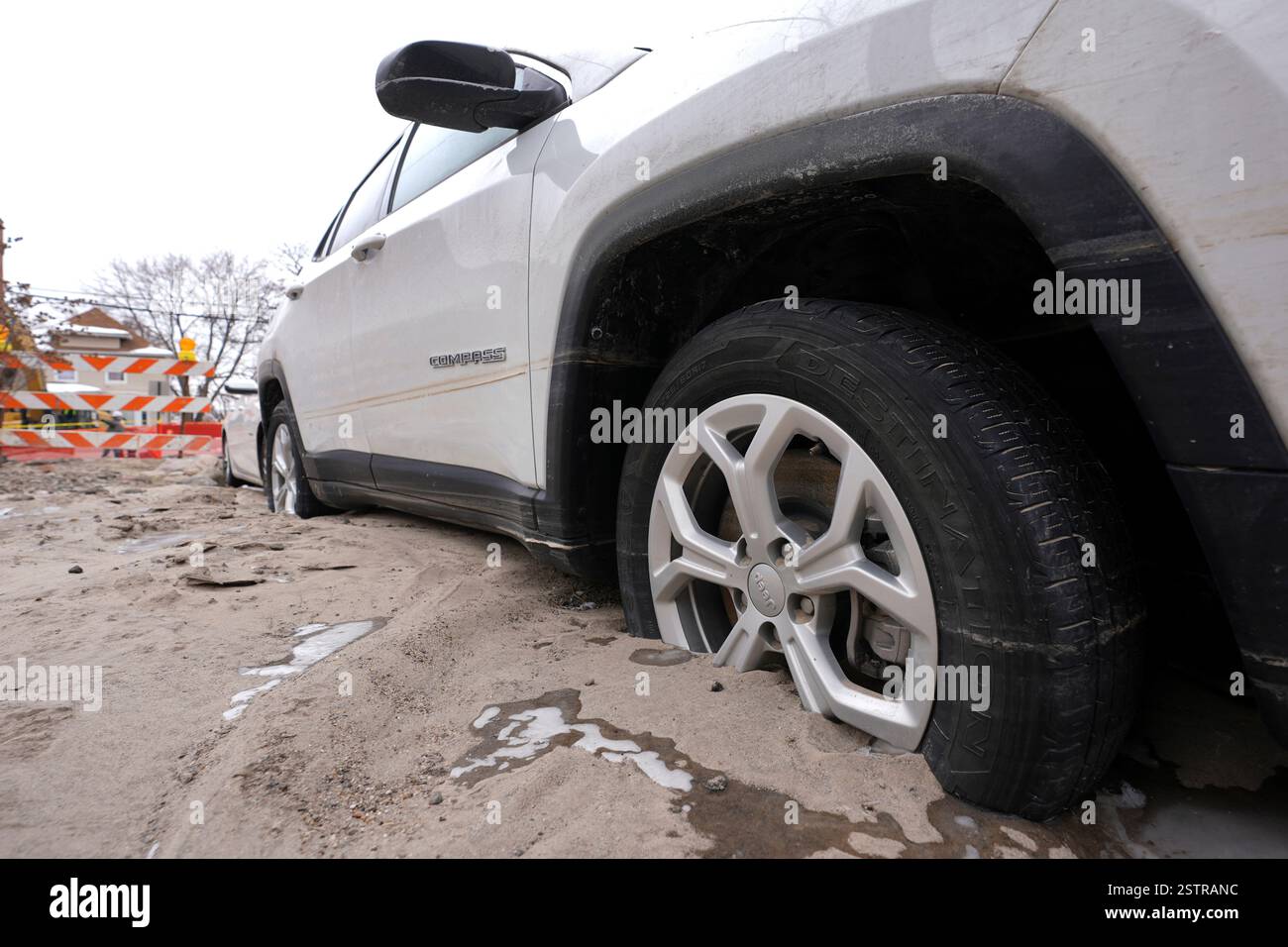 The tire of a vehicle is submerged in dirt Wednesday, Feb. 19, 2025 ...