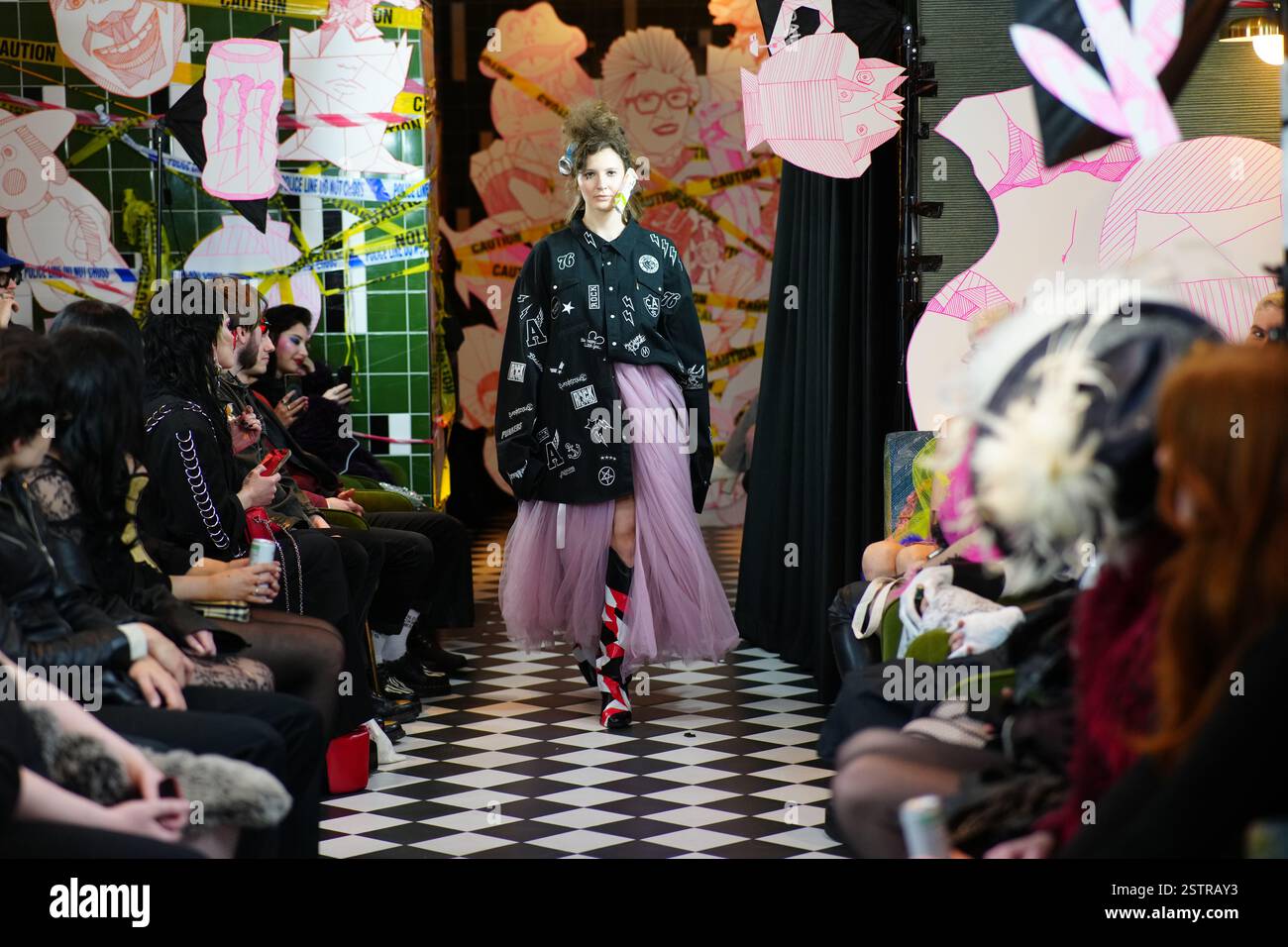 Models on the catwalk during the VIN + OMI London Fashion Week show at ...