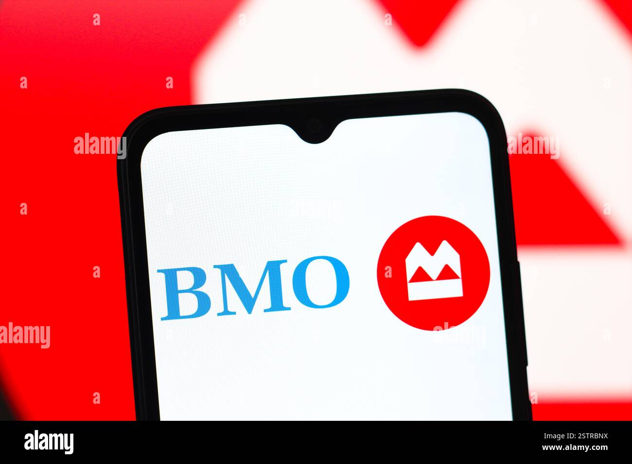 In this photo illustration, the Bank of Montreal (BMO) logo is seen ...