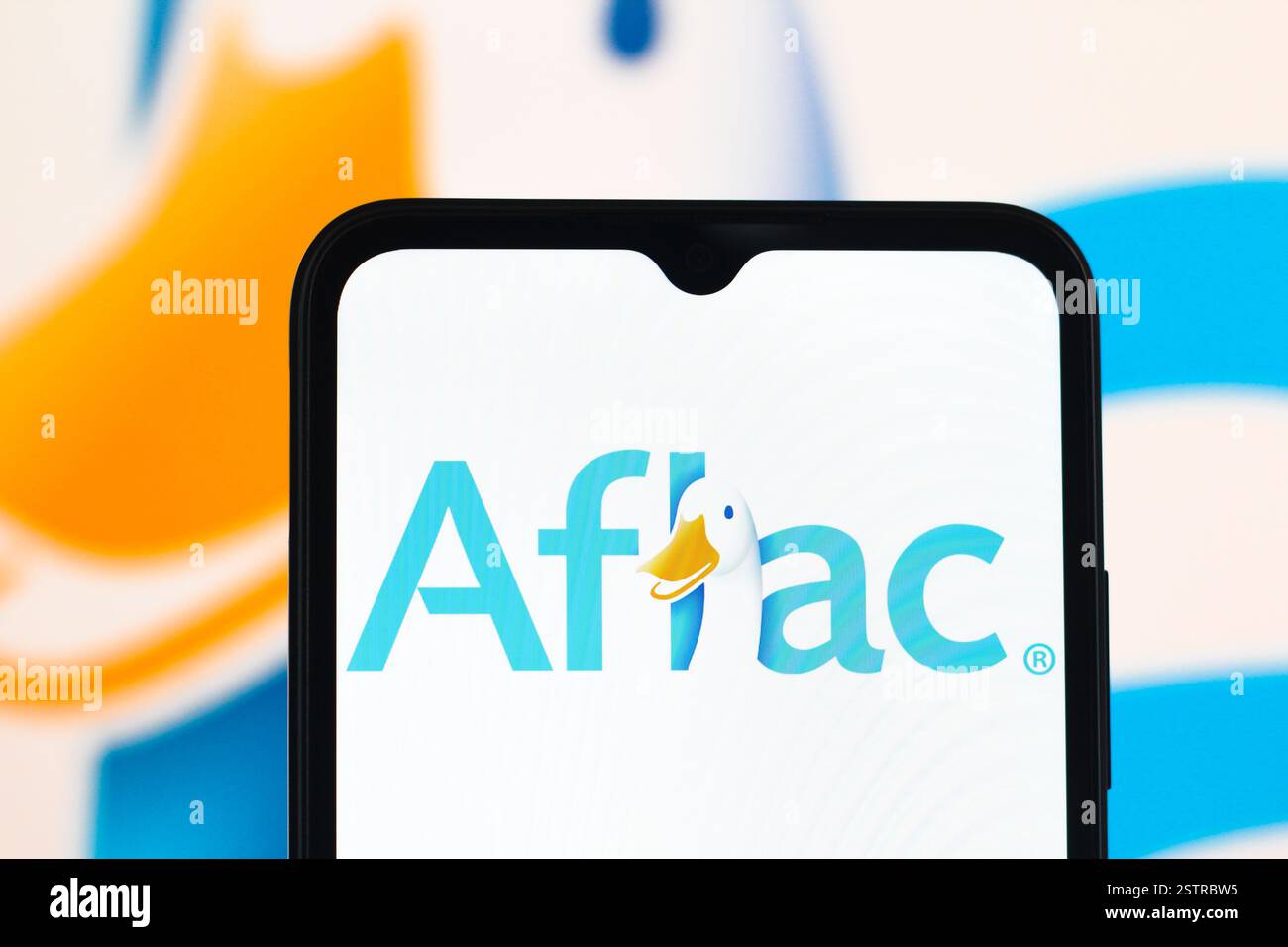 In this photo illustration, the Aflac Incorporated logo is seen ...