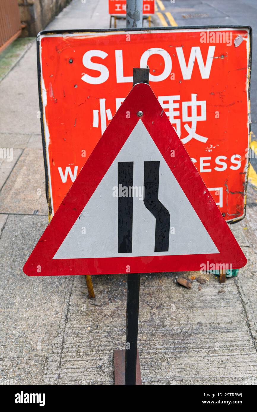 Slow Narrow Sign Stock Photo - Alamy