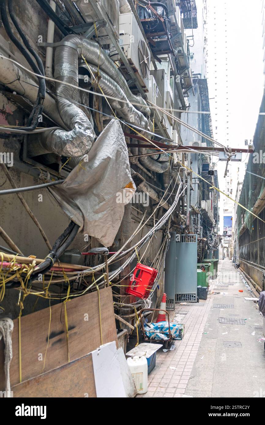 Electric cables and wires chaos mess in back alley hi-res stock ...