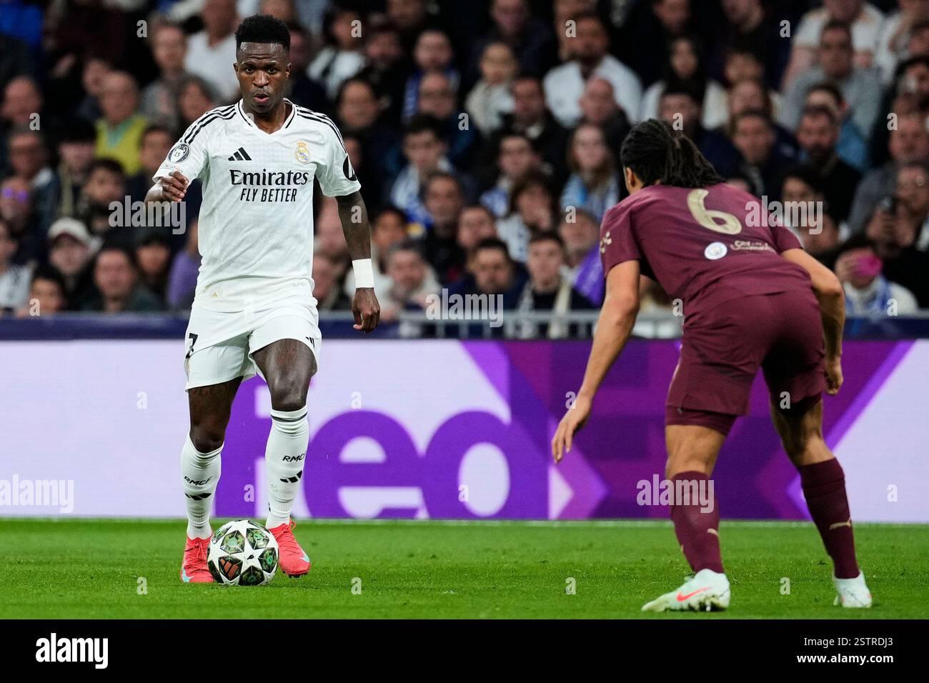 Vinicius Junior of Real Madrid CF and Nathan Ake of Manchester City during Real Madrid vs ...