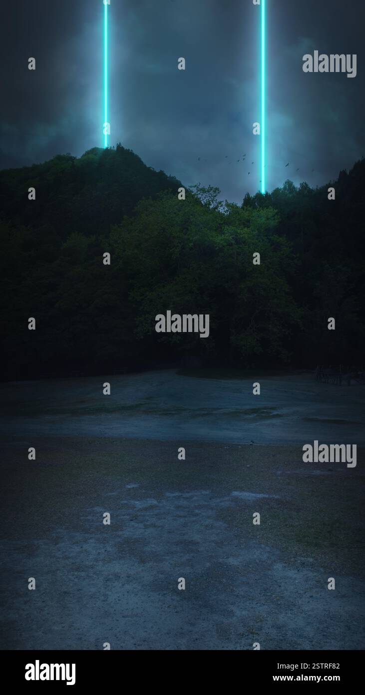 Composite image. Twin neon blue light beams shooting into cloudy night ...