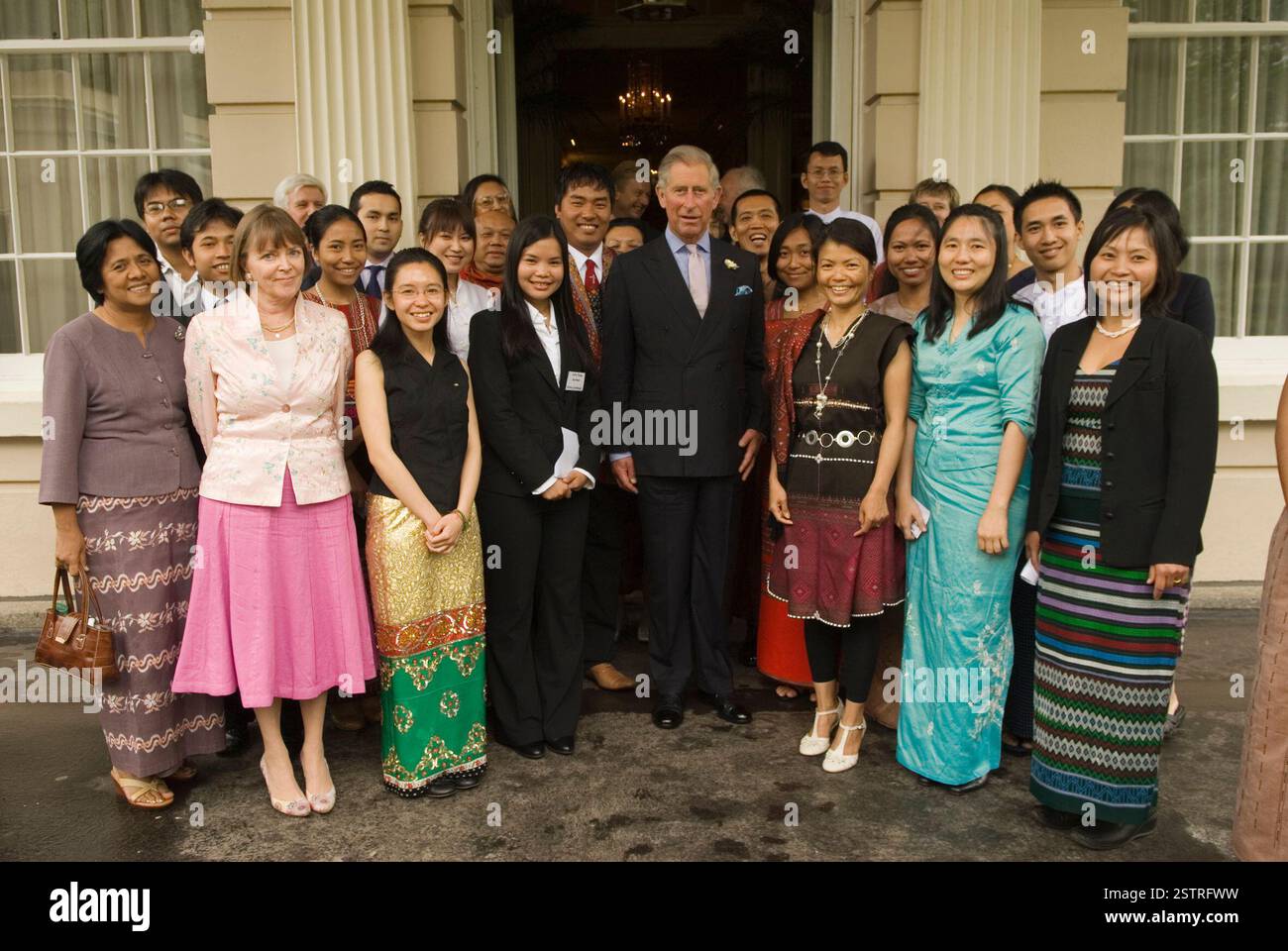 Zoya Phan dark suit standing next to Prince Charles, Prospect Burma ...