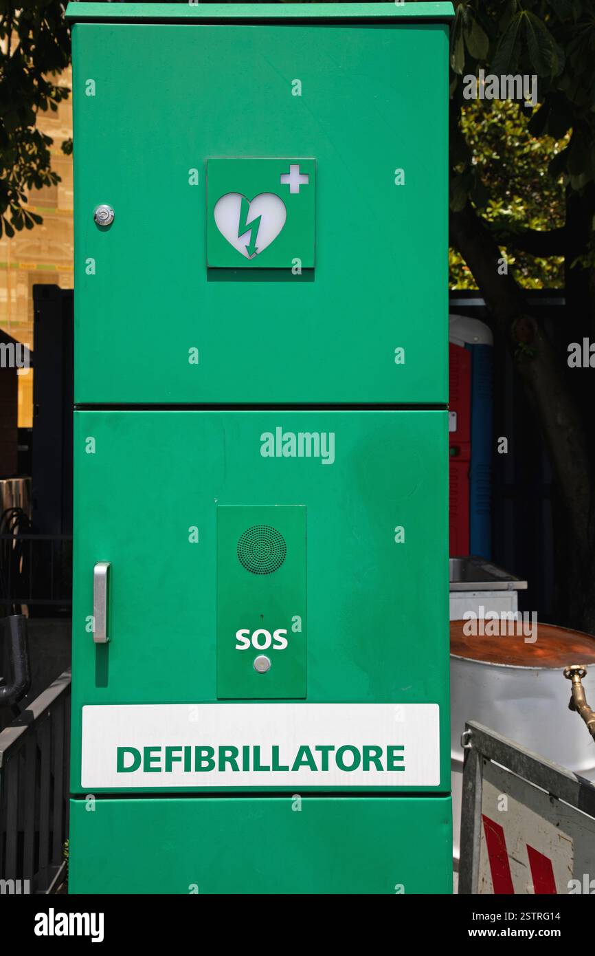Big green defibrillator device at street in city hi-res stock ...