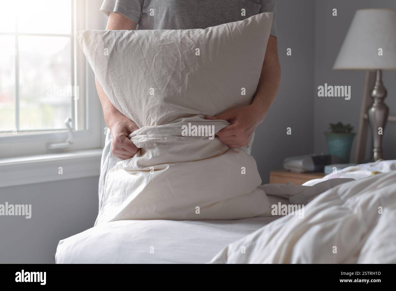 Household housewife making bed hi-res stock photography and images - Alamy