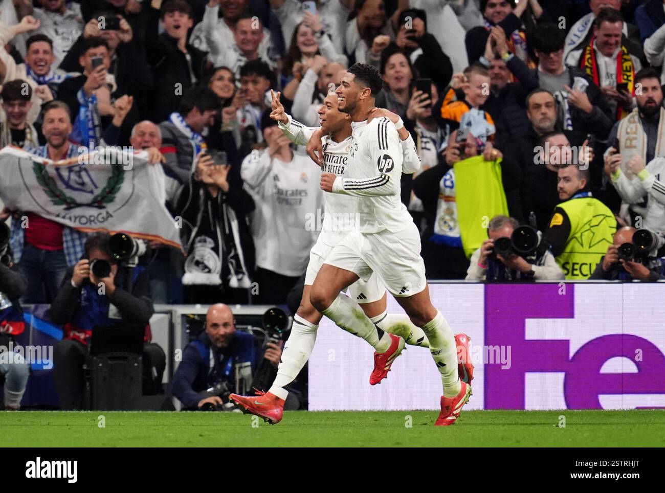 Real Madrid's Kylian Mbappe (left) celebrates with Jude Bellingham ...