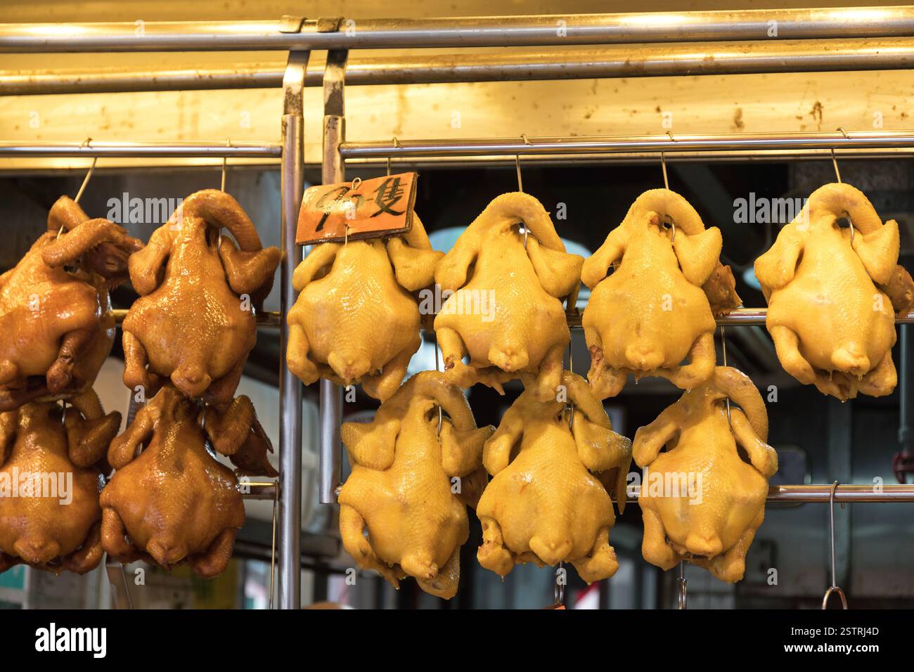 Hanging on meat hooks hi-res stock photography and images - Alamy