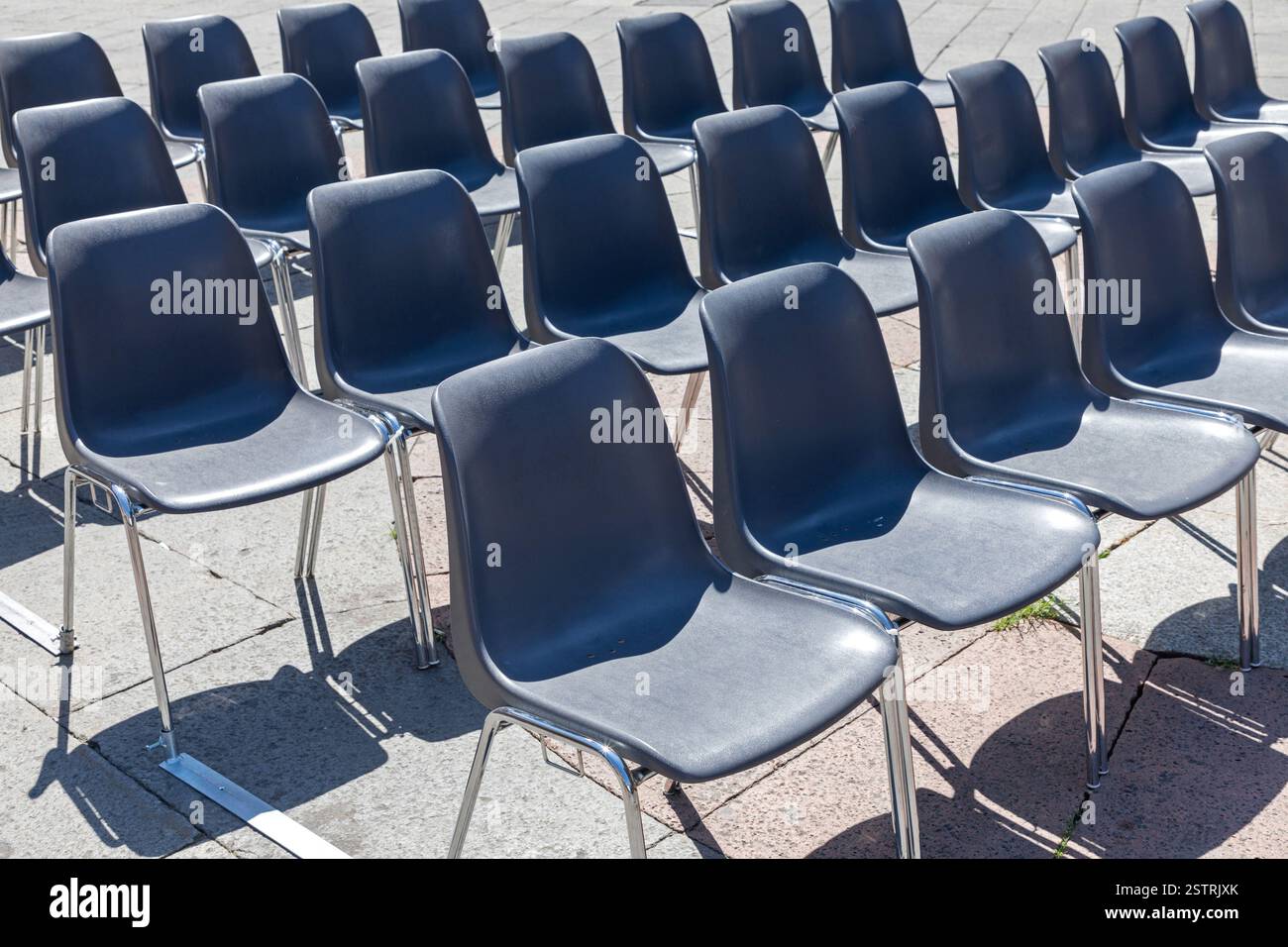Plastic chairs for audience at outdoor event hi-res stock photography ...