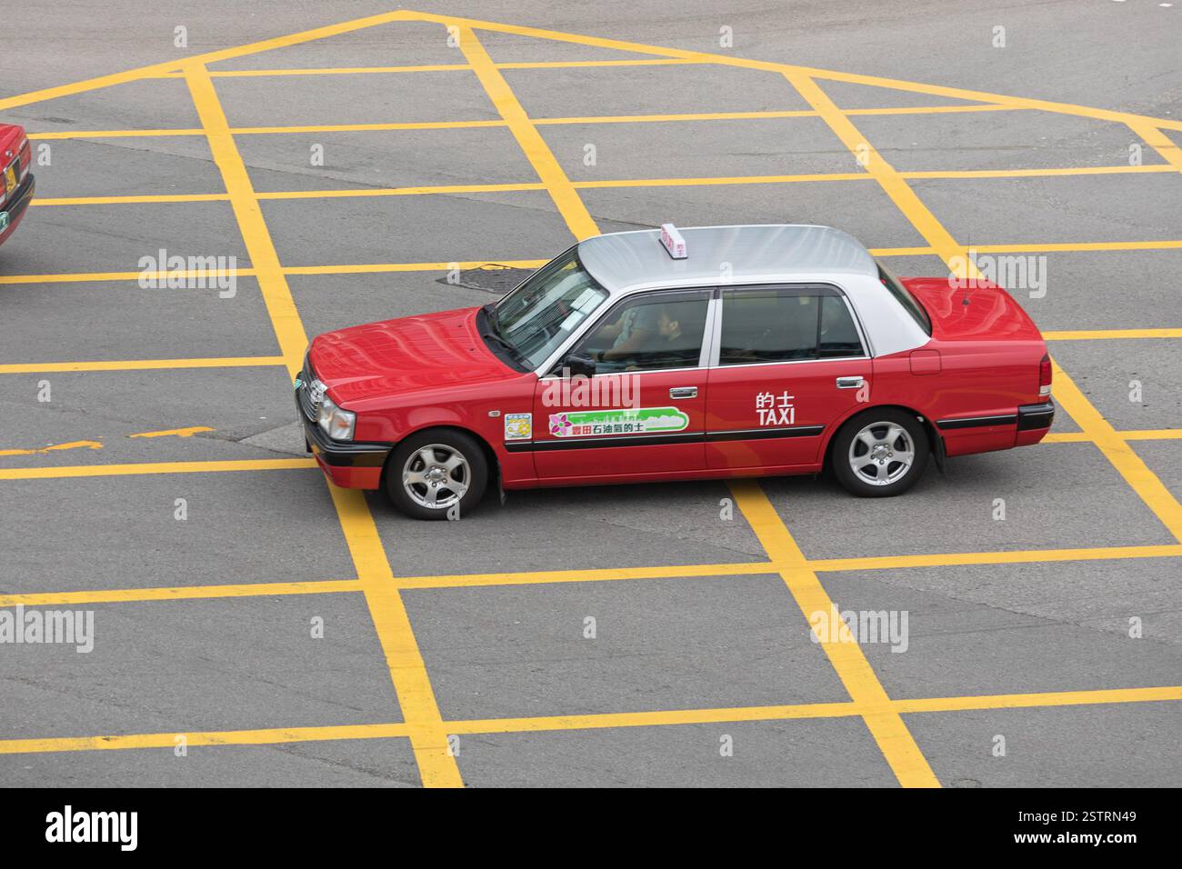 Red Taxi Hong Kong Stock Photo - Alamy