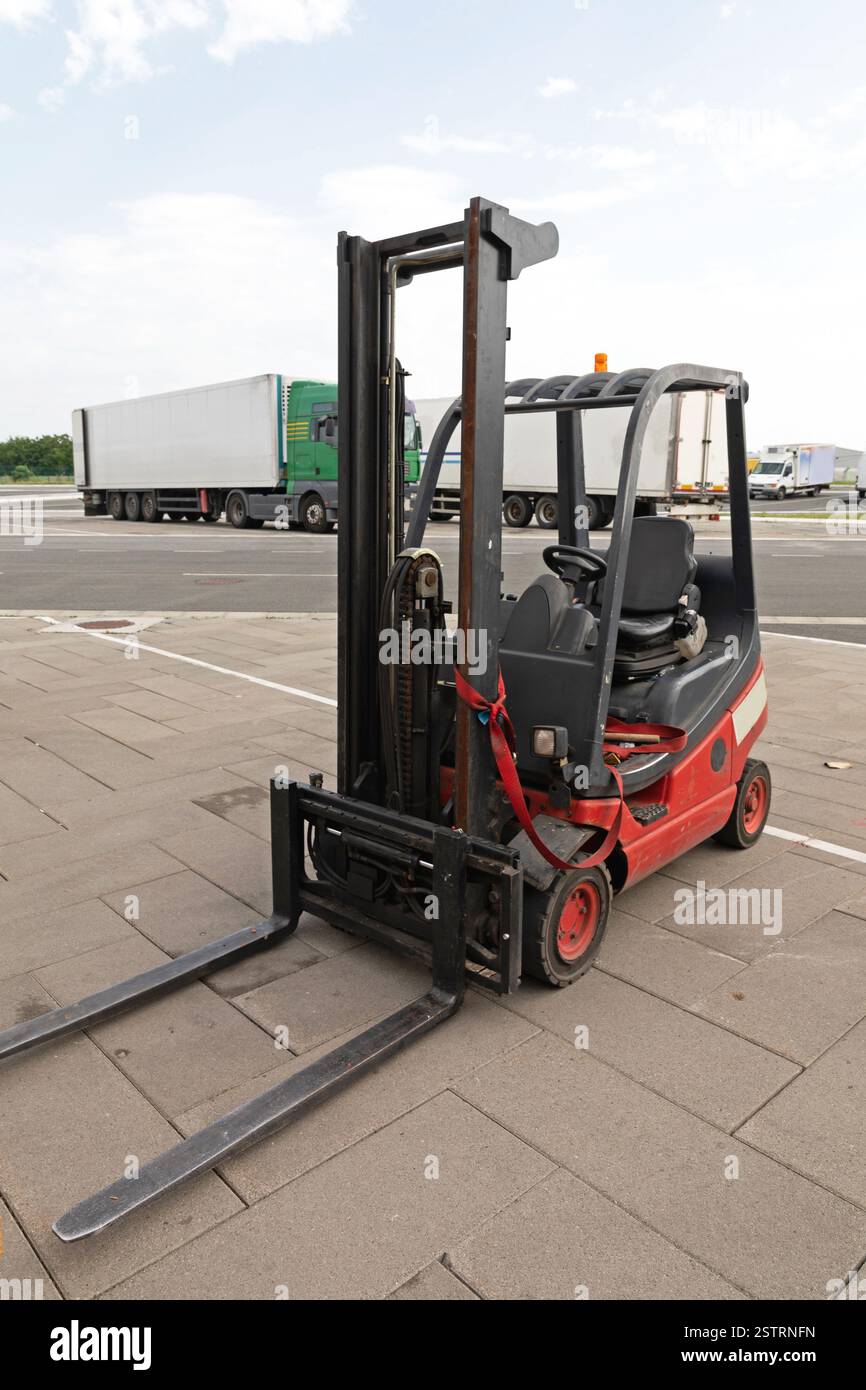 Gas powered red forklift cargo truck outside hi-res stock photography ...