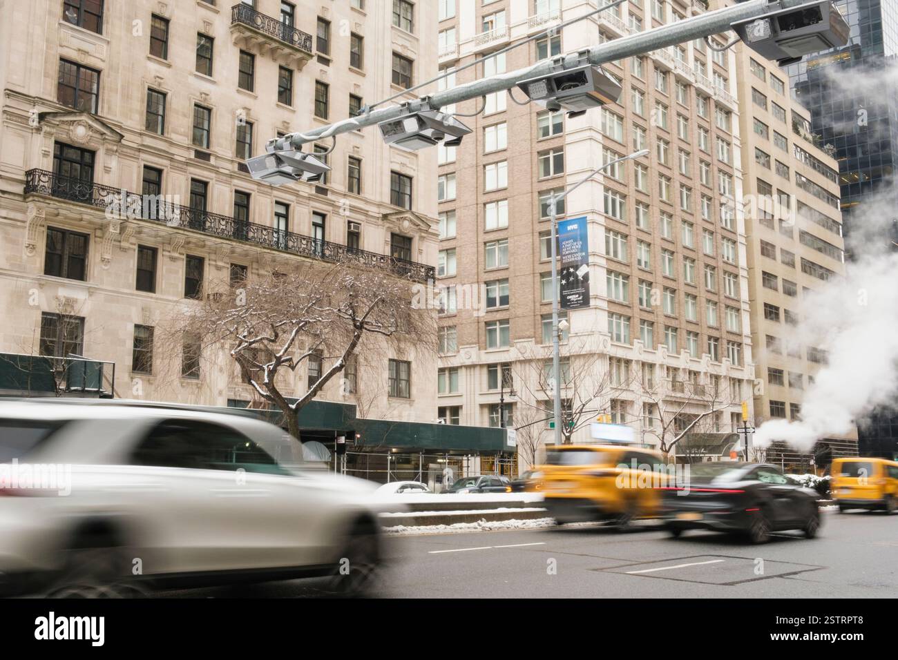 NEW YORK CITY/USA February 12 2025: Cars and taxi cabs entering ...