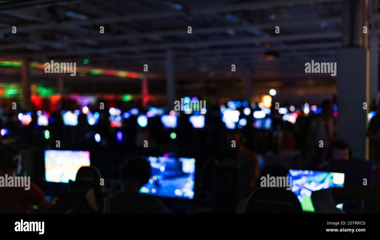 Indoor space with computer screens and neon lights during esports ...
