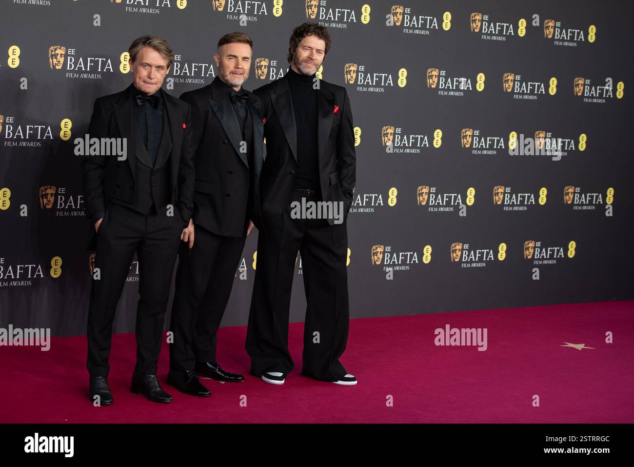 (L-R) Mark Owen, Gary Barlow and Howard Donald of Take That attend the ...