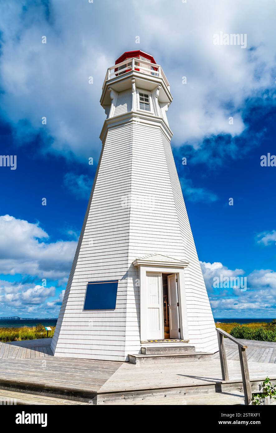 A view towards a lighthouse by the Confederation bridge, Prince Edward ...