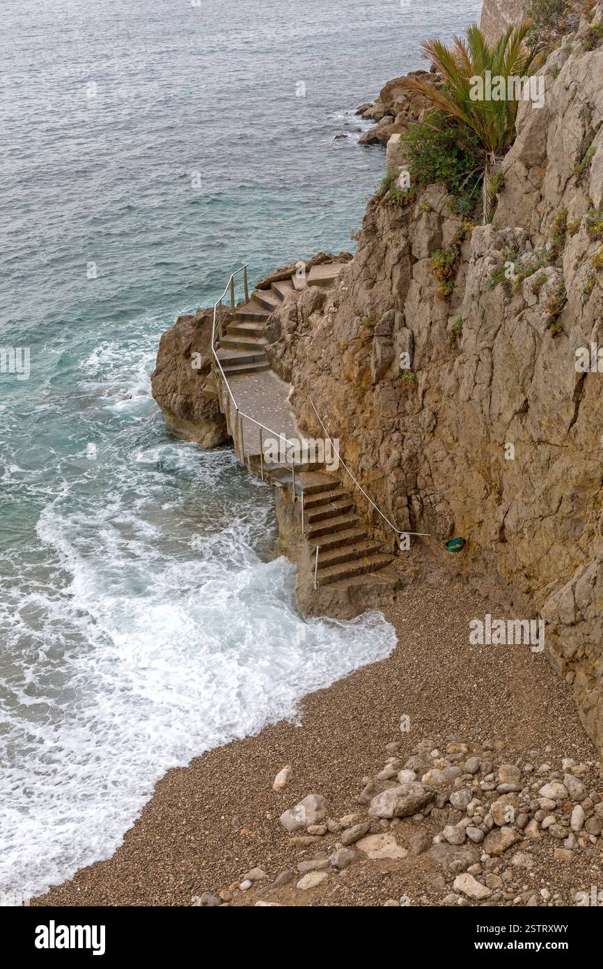 Concrete stairs to small beach in monaco hi-res stock photography and ...