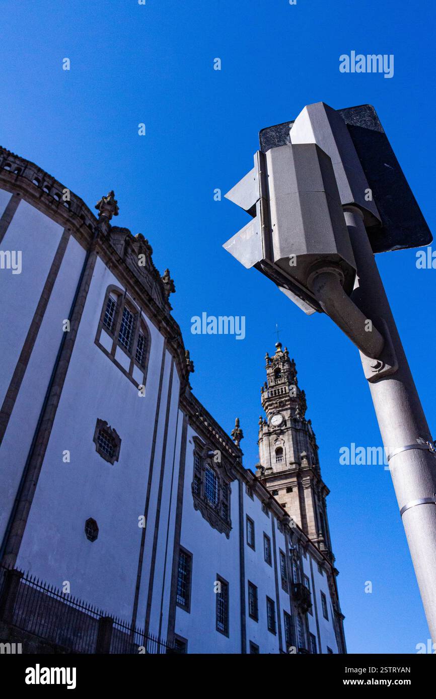 Traffic light and Clérigos Tower in Porto, Portugal, blending modern ...