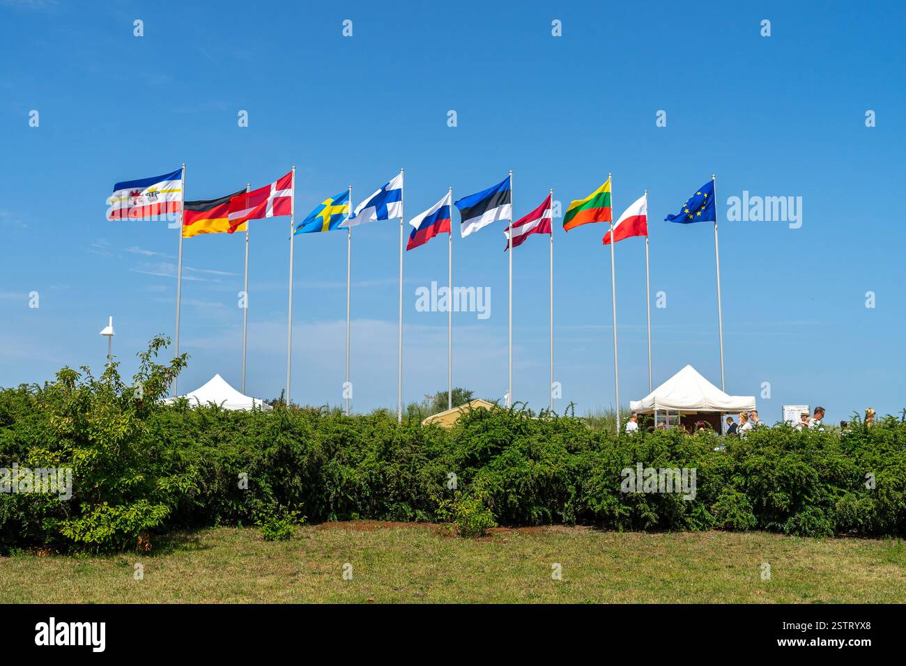 National flags of different countries on the waterfront Stock Photo - Alamy