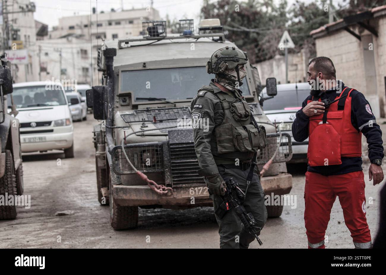 Jenin, Palestine. 19th Feb, 2025. Israeli soldiers block the road to ...